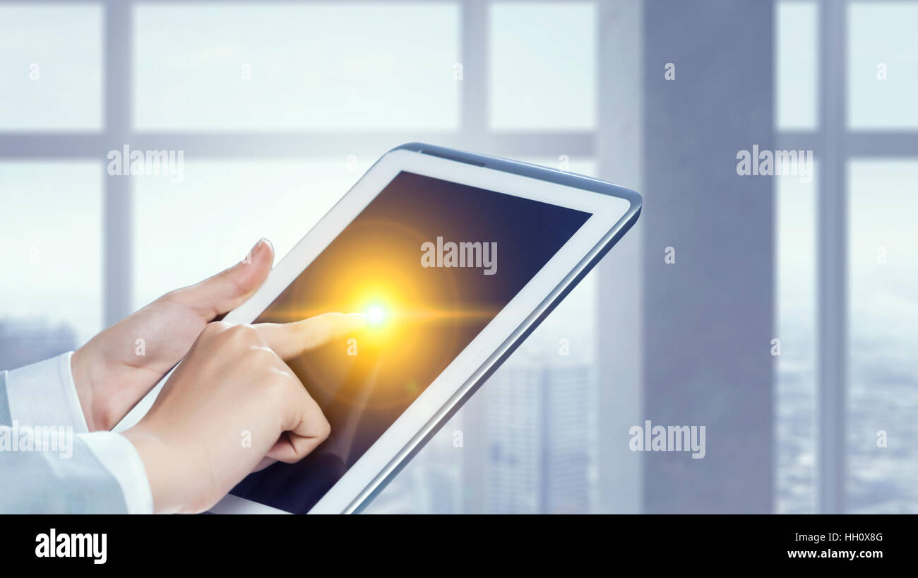 Hands using tablet hi-res stock photography and images - Alamy