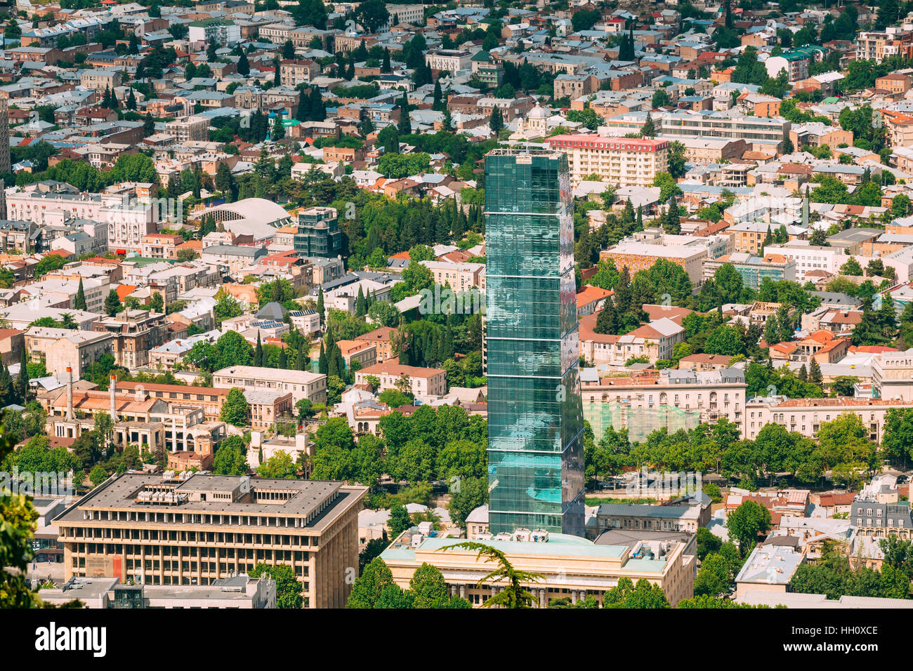 Tbilisi, Georgia. Aerial View Of New Glass Skyscraper Surrounded By ...