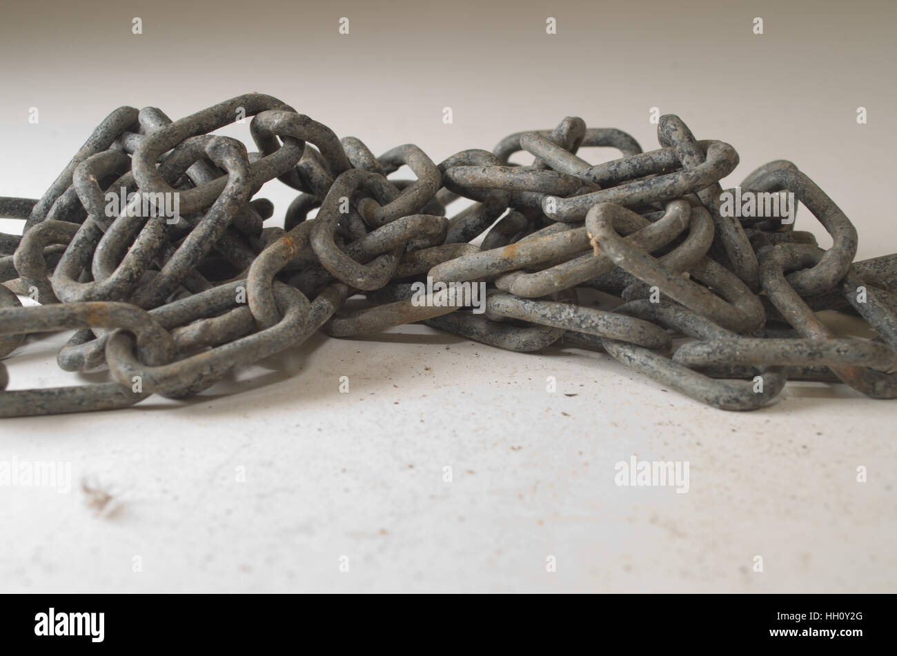 Galvanised chain in pile Old UK Stock Photo - Alamy