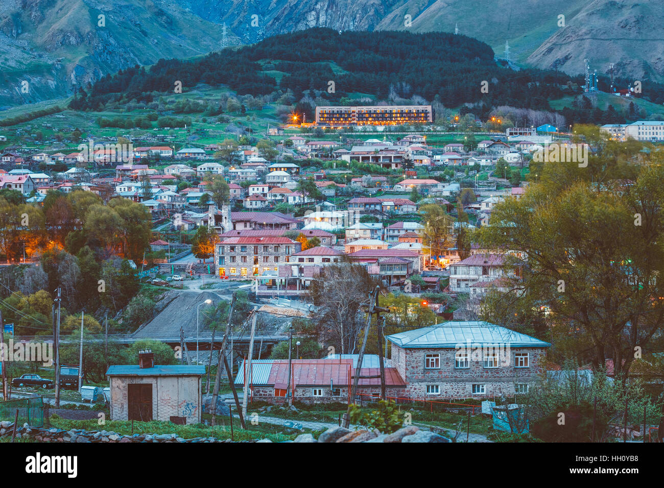 Stepantsminda Village At Evening Or Night Time On Mountain Background ...
