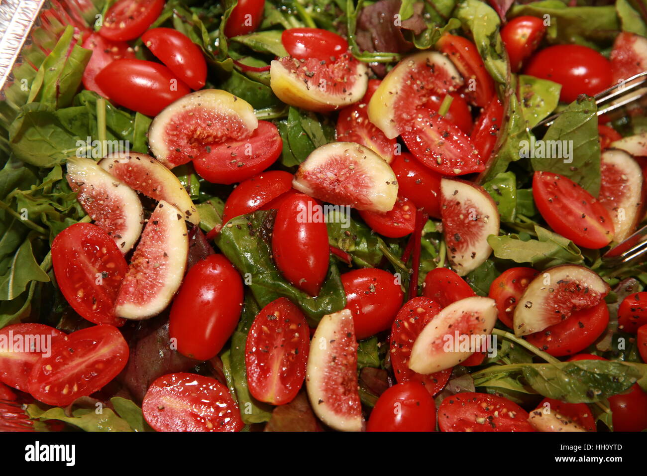 tomatoes with figs and basil Stock Photo - Alamy