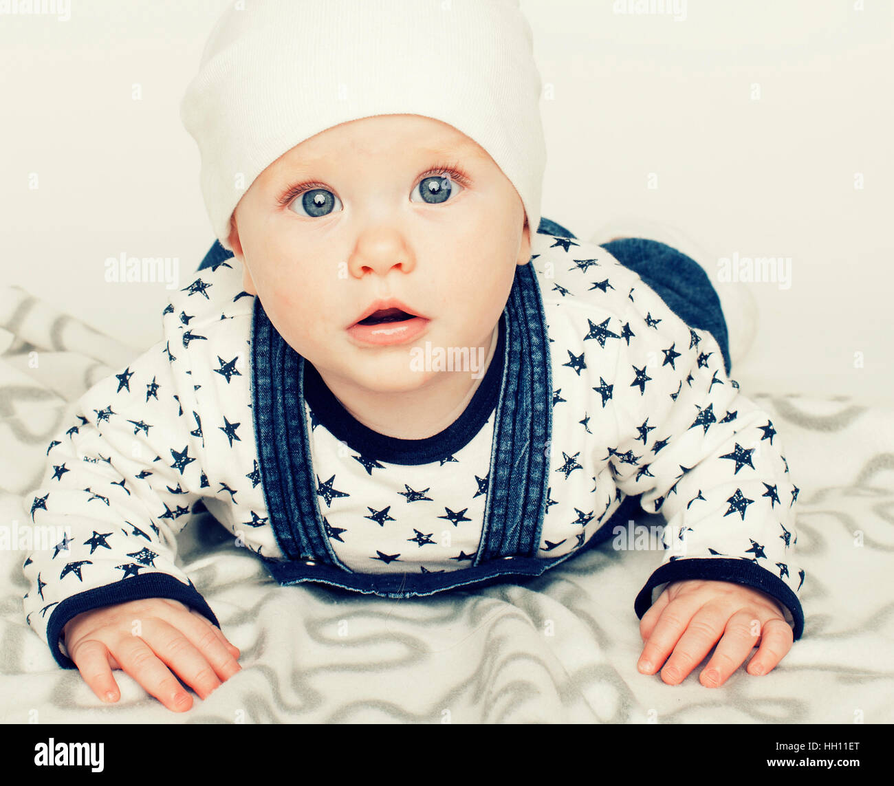 little cute baby toddler on carpet isolated close up smiling ado Stock ...