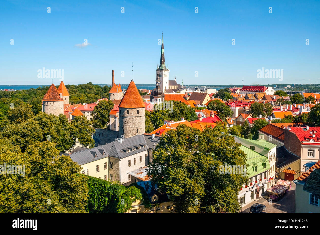 Cityscape of old town Tallinn with bright roofs in sunlight, Estonia ...