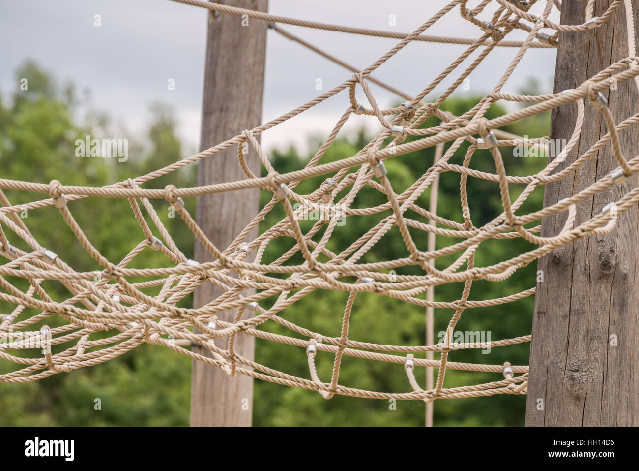 Climbing net made of rope at a playground Stock Photo - Alamy