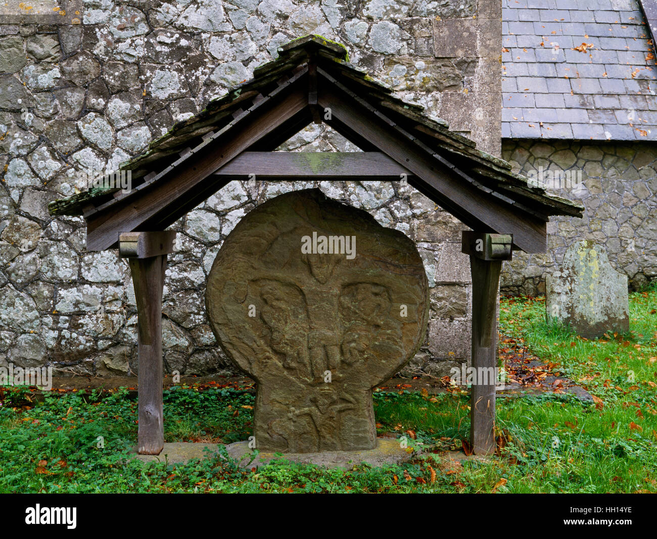 C9th disc-headed cross-slab, Llangan church: crucified Christ flanked ...