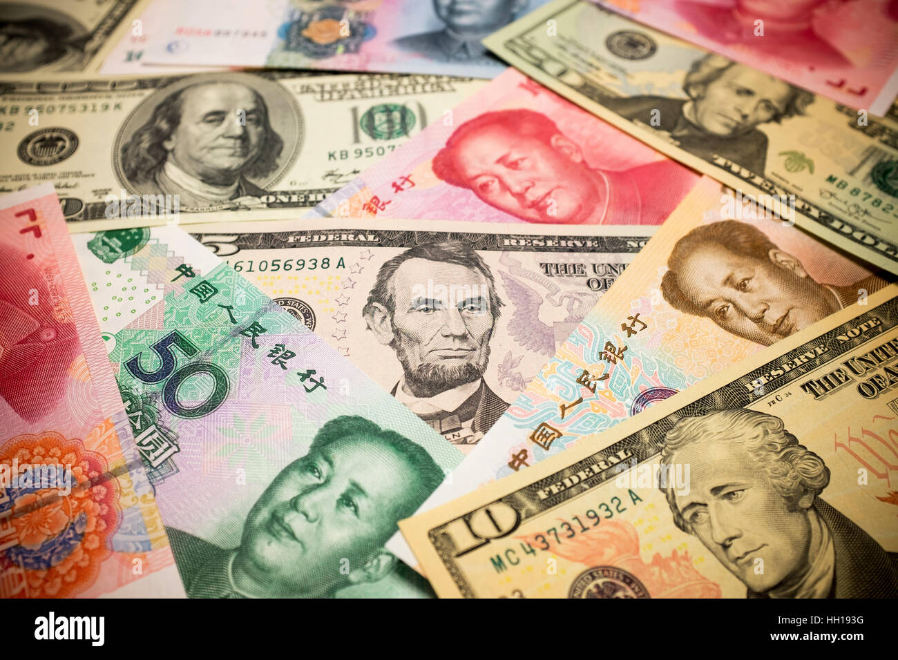 Chinese Yuan Note and U.S. dollar background (Exchange rate concept ...