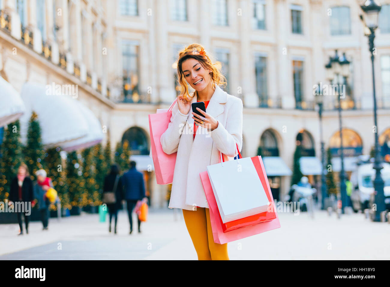 Woman doing shopping in Paris, Place Vendome Stock Photo - Alamy