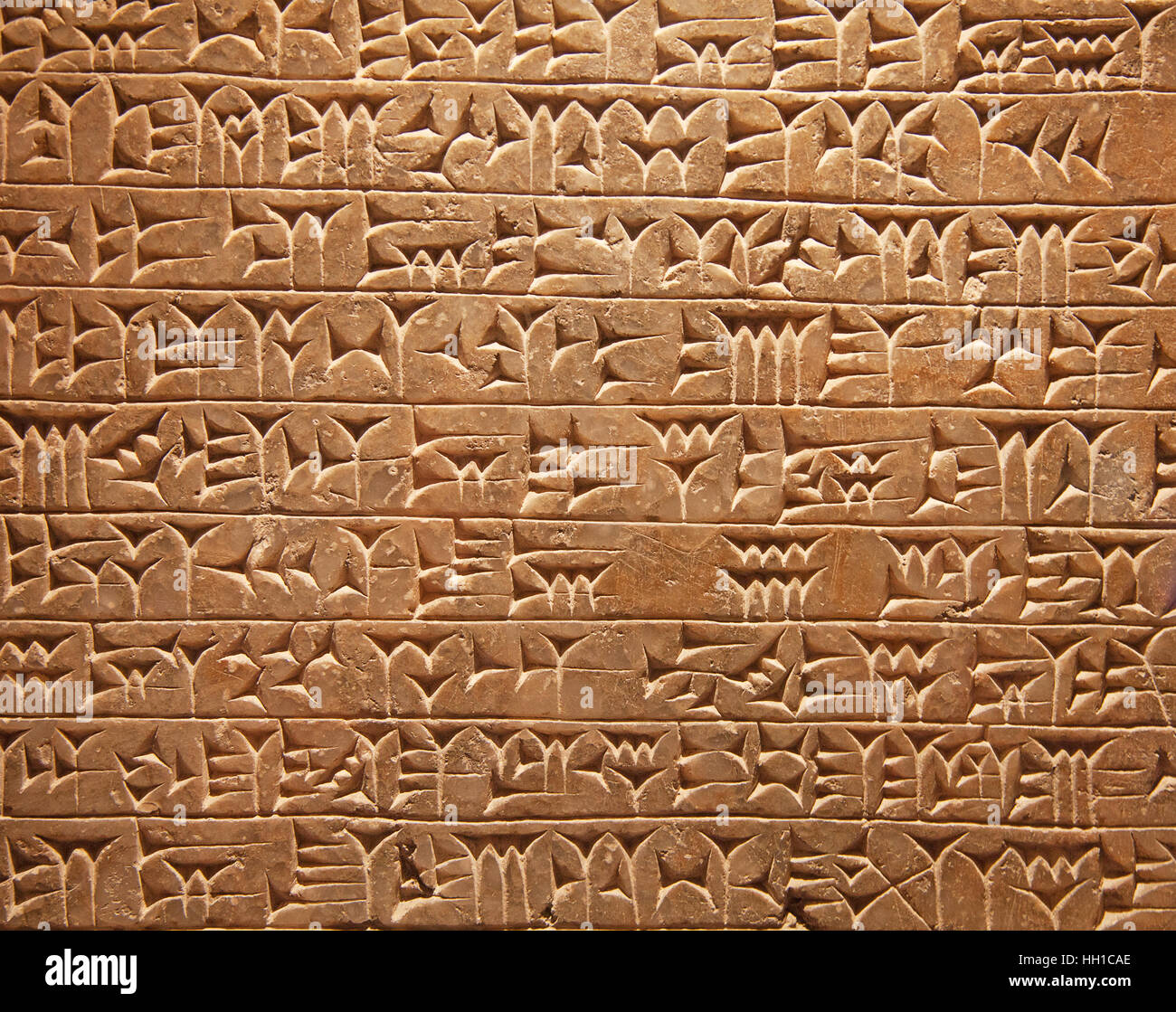 Ancient sumerian stone carving with cuneiform scripting Stock Photo - Alamy
