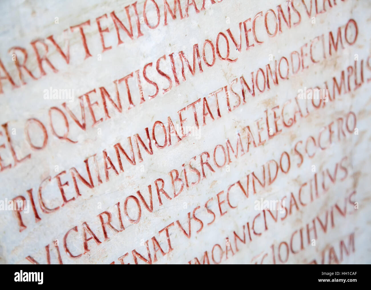 Pre-christian latin writing carved on the tombstone Stock Photo - Alamy