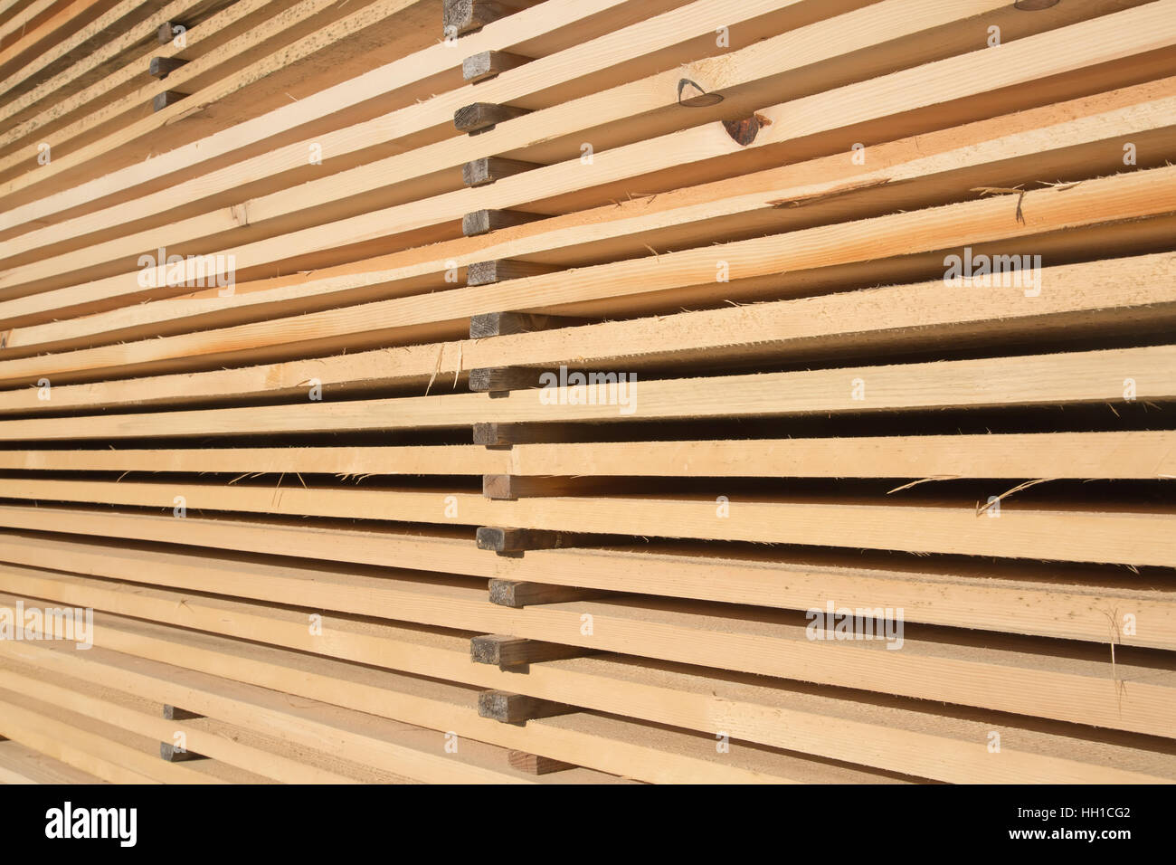 Stack of new wooden studs at the lumber yard Stock Photo - Alamy