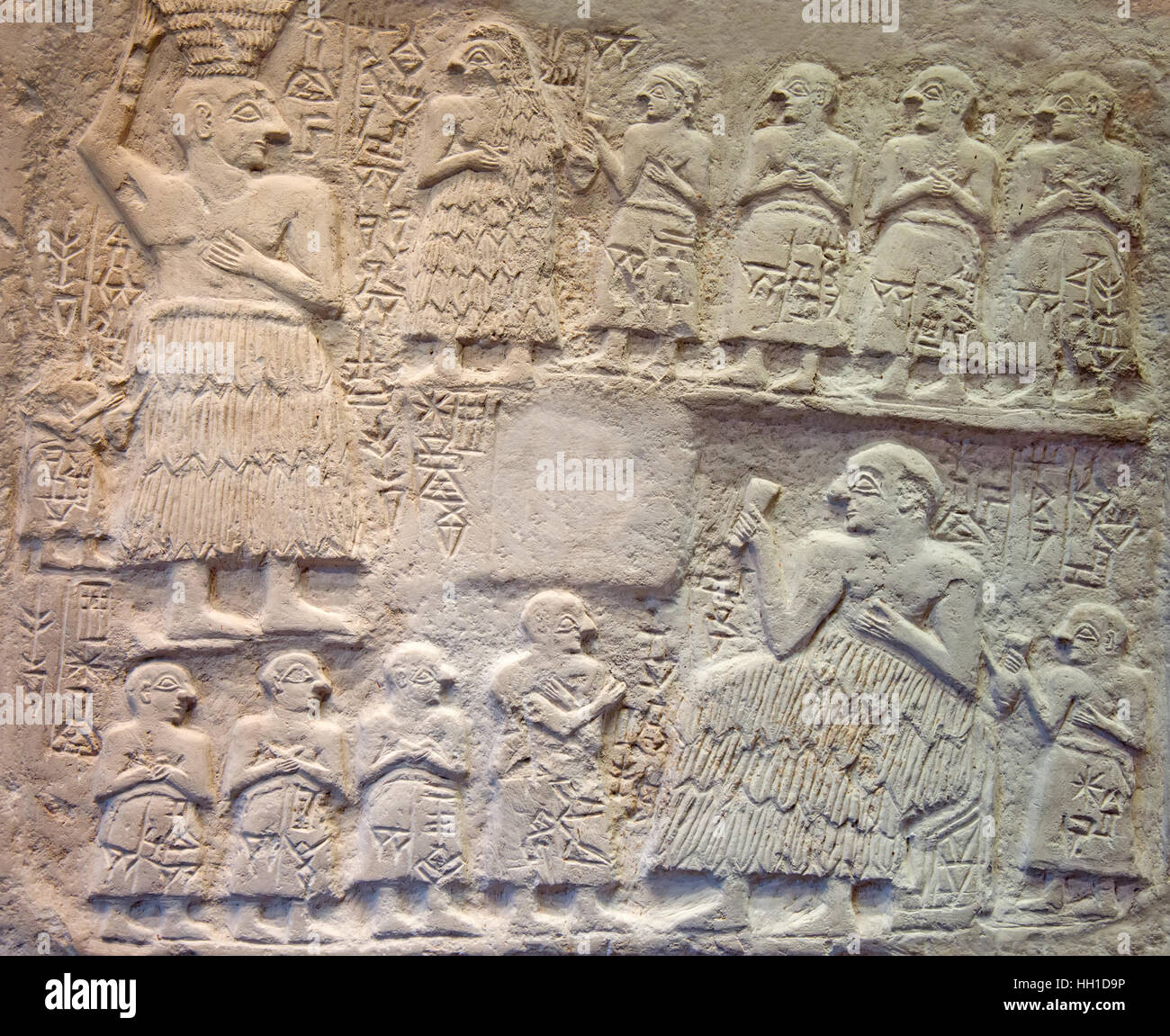 Ancient sumerian stone carving with cuneiform scripting Stock Photo - Alamy