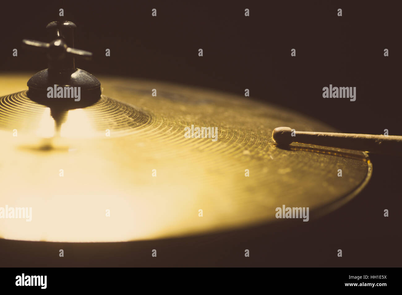 Close up shot of a drumstick hitting a cymbal Stock Photo - Alamy