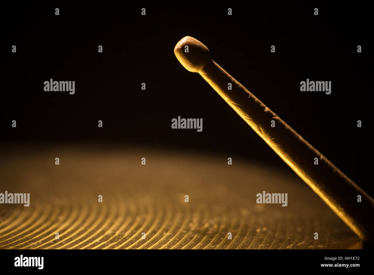 Close up shot of a drumstick hitting a cymbal Stock Photo - Alamy