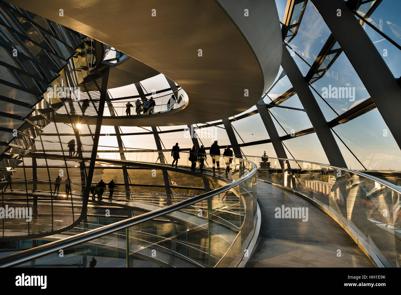 Interior of Reichstag dome with visitors in evening light, Reichstag ...