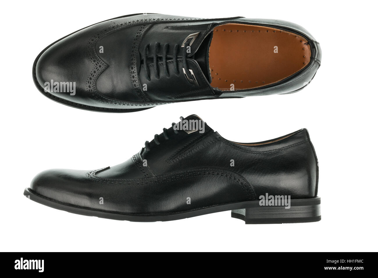 Classic male black leather shoes isolated on a white. Top view. Side ...