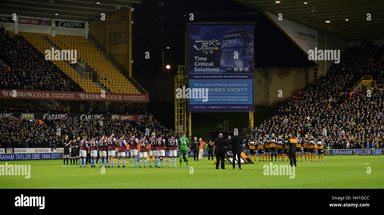Players and fans observe a minutes applause in memory of Graham Taylor ...