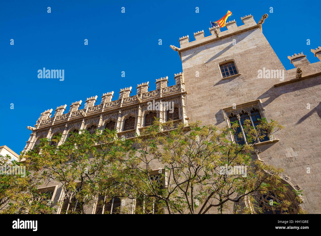 Autumn background with historical castle ,trees and blue sky ,in the ...