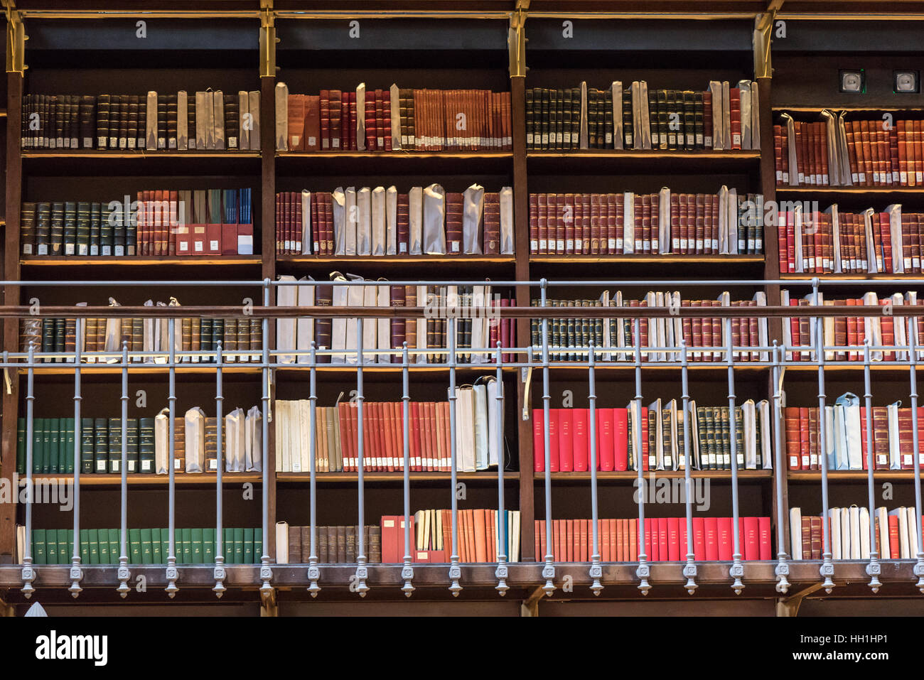 Very old books in a old wooden library Stock Photo - Alamy