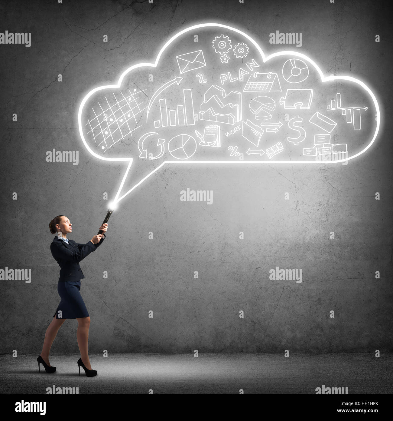 Woman throwing light on her ideas Stock Photo - Alamy