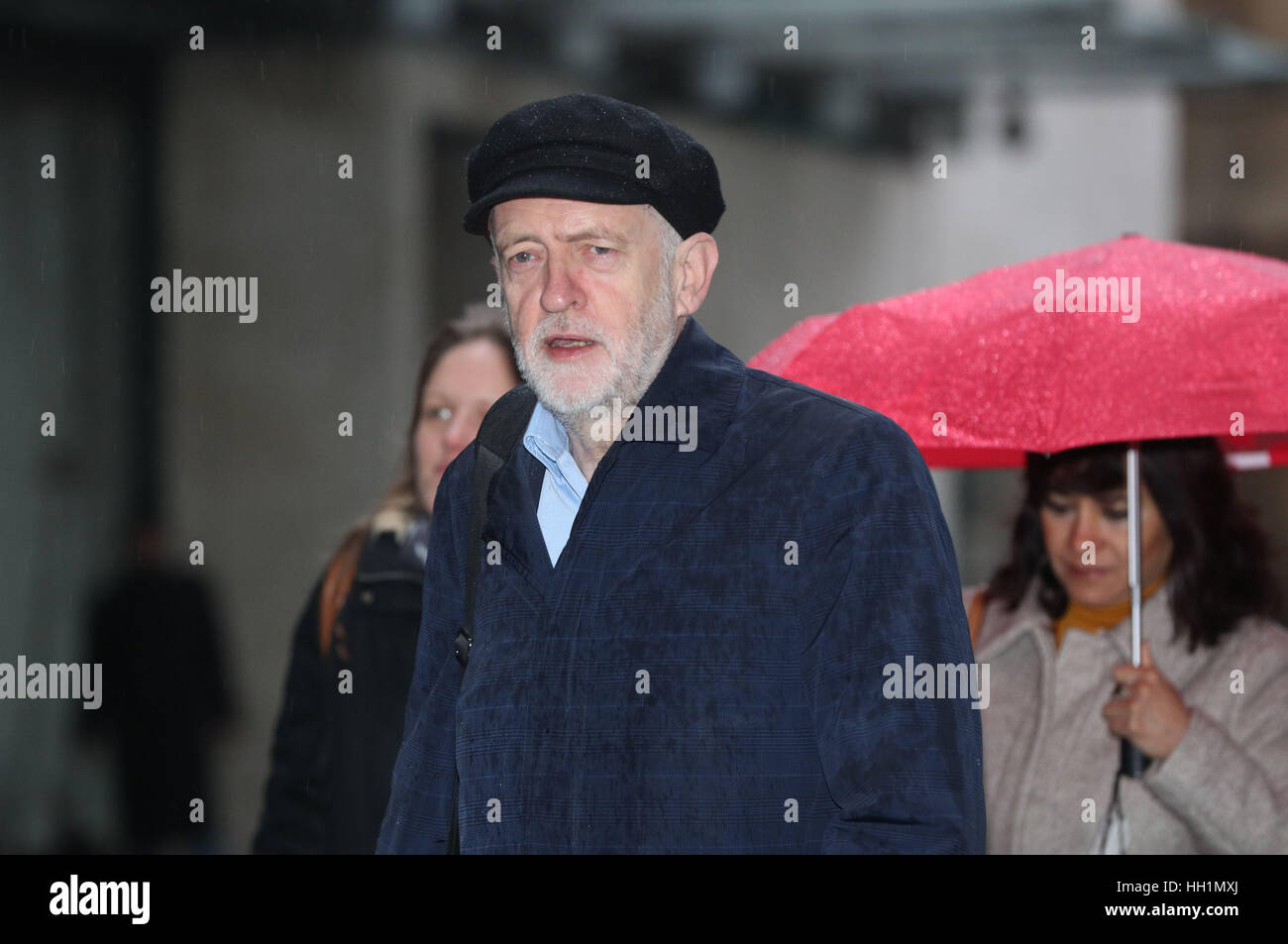 Labour Party leader Jeremy Corbyn, followed by his wife Laura Alvarez ...