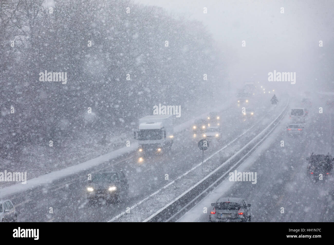 Winter, heavy snowfall, traffic on the A52 motorway near Essen, Germany ...