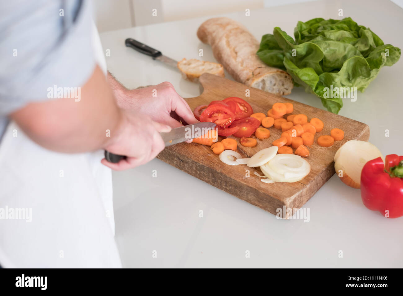 Hands Cutting Vegetables High Resolution Stock Photography and Images ...