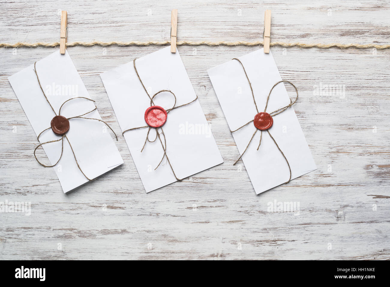 Mail envelope on rope Stock Photo - Alamy