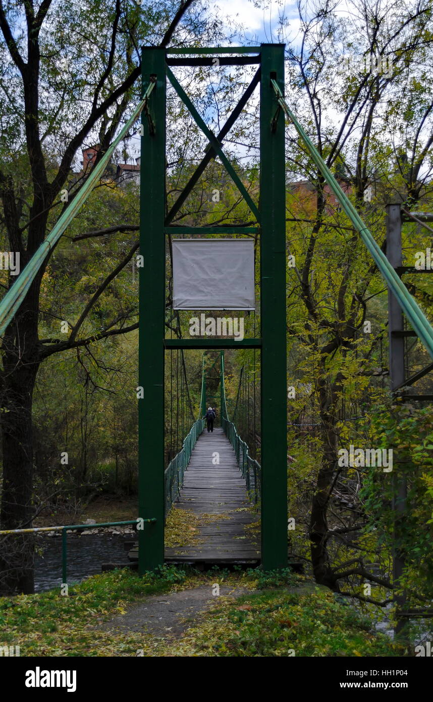 Catenary bridge over river Iskar in the autumn, Iskar defile, Lakatnik ...