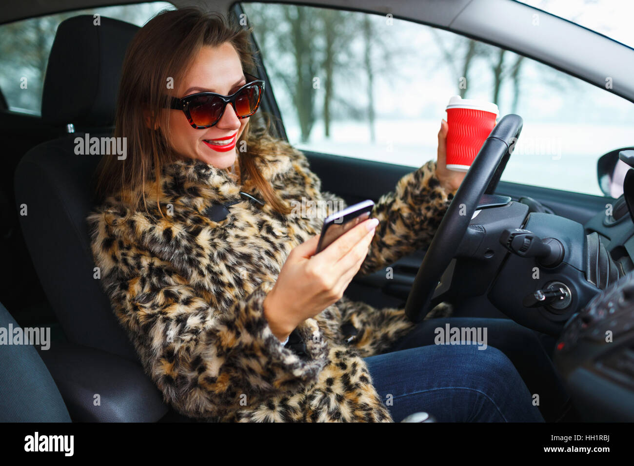 Elegant woman in a fur coat hi-res stock photography and images - Alamy