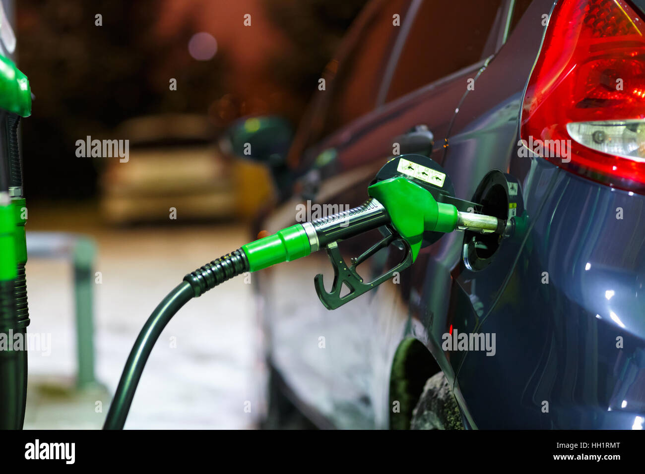Car refueling night hi-res stock photography and images - Alamy