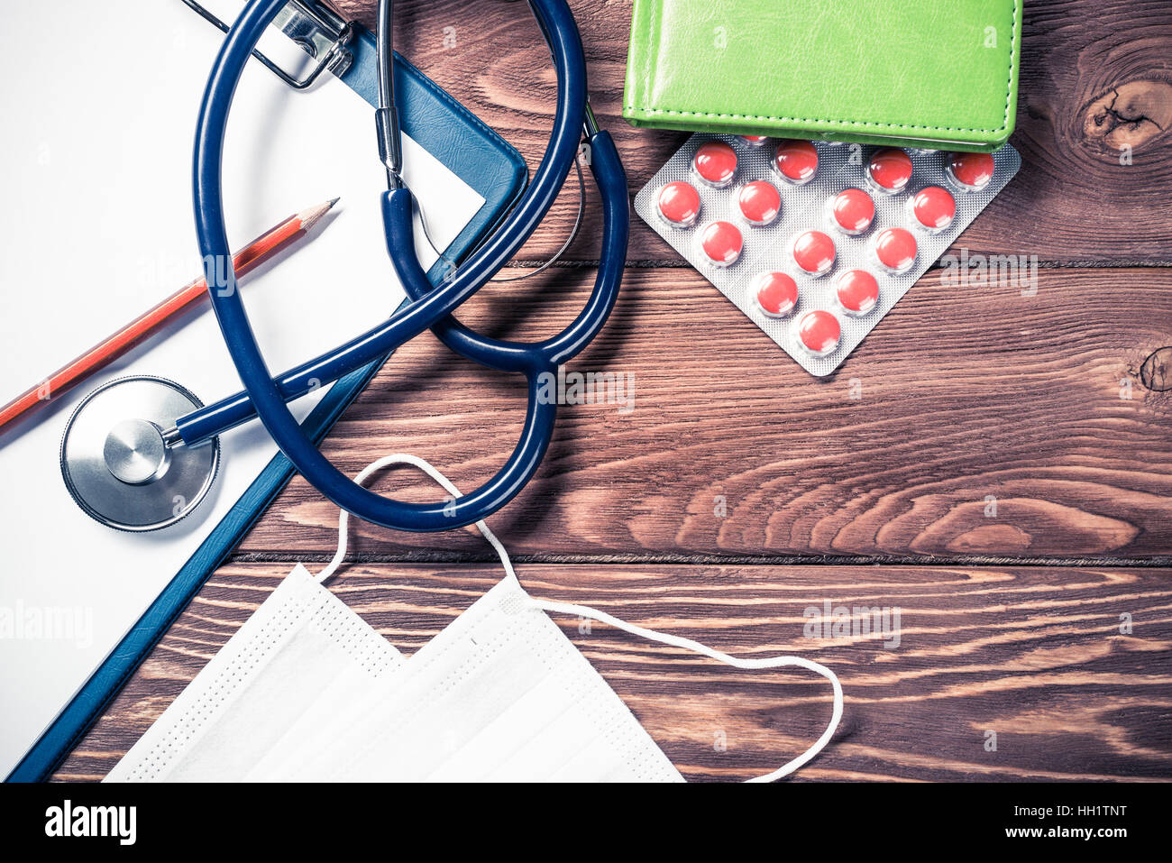 Desk of doctor with medicine things Stock Photo - Alamy