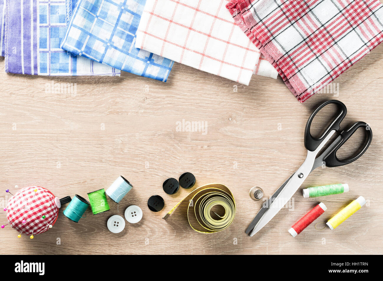 Sewing kit on table Stock Photo - Alamy