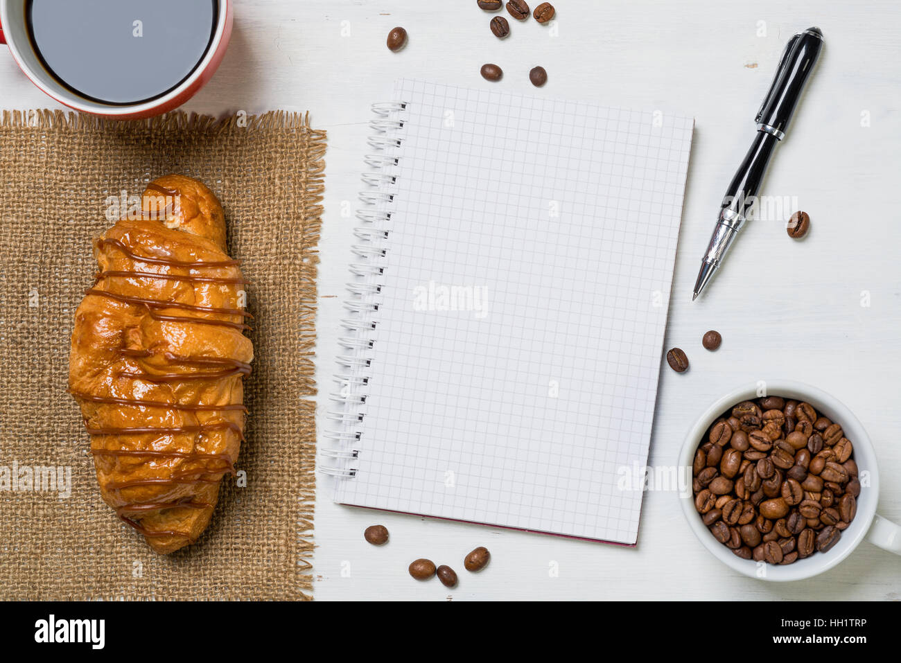 Coffee break with snack Stock Photo - Alamy