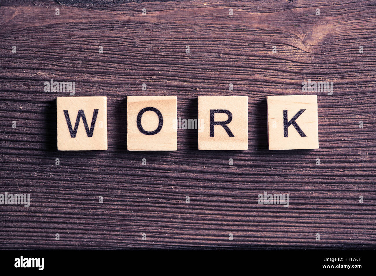 wooden elements with word work Stock Photo - Alamy