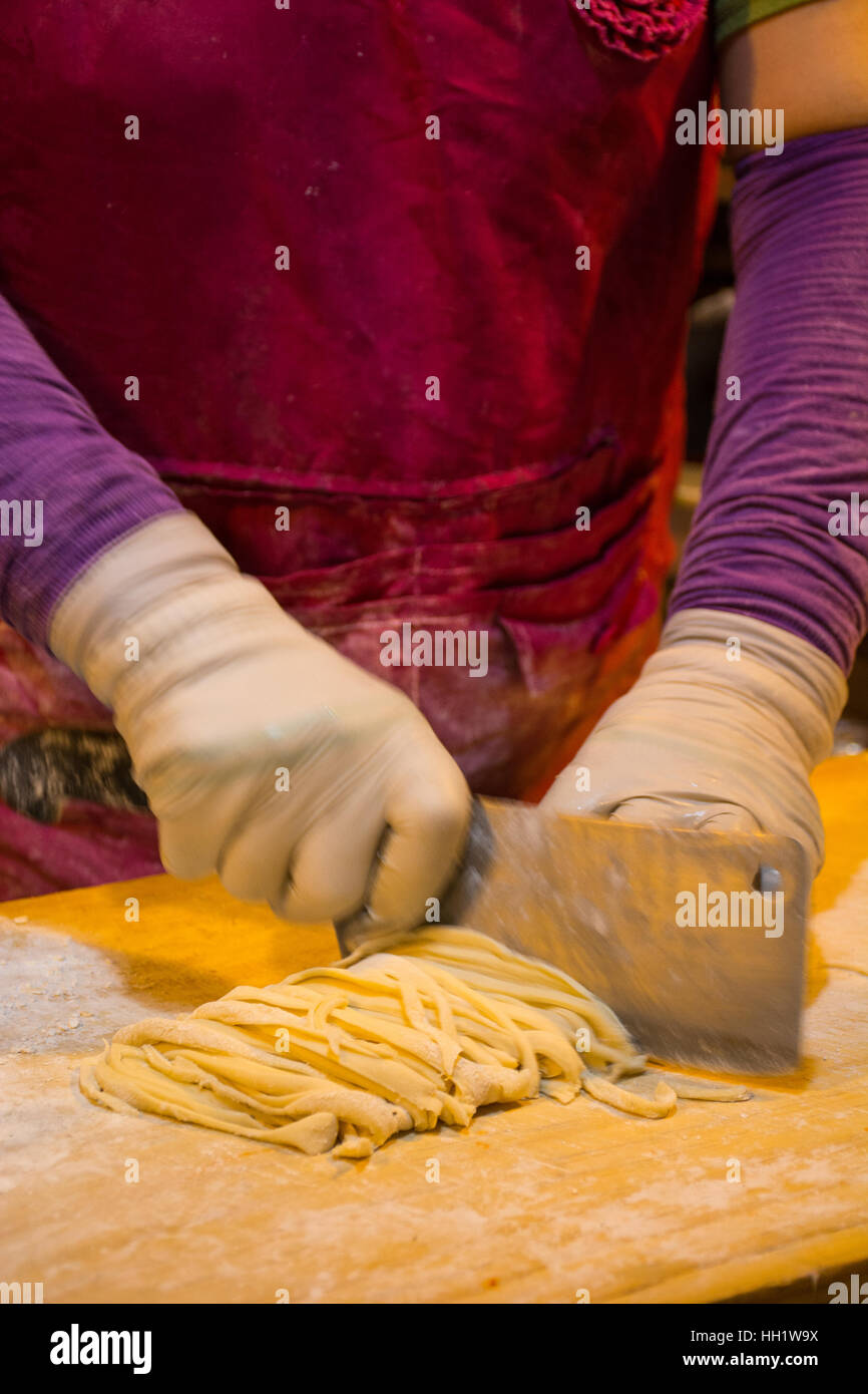 Hand-cut fresh noodles Stock Photo - Alamy