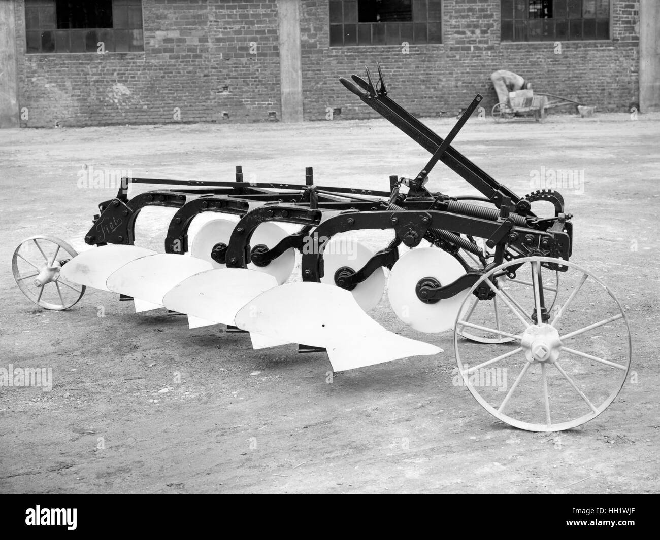 Vintage agricultural machinery Black and White Stock Photos & Images ...