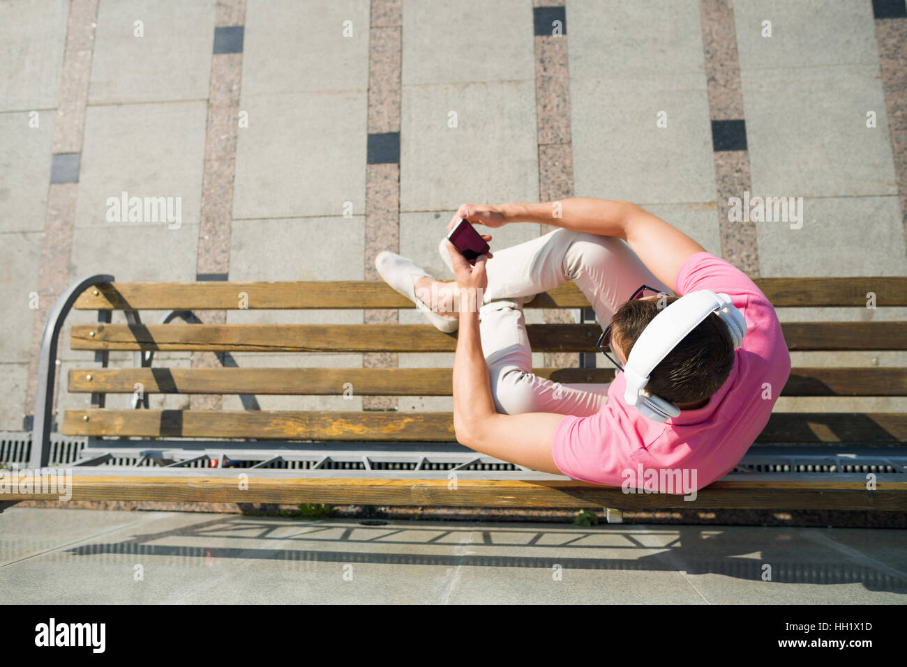 Handsome guy on bench Stock Photo - Alamy