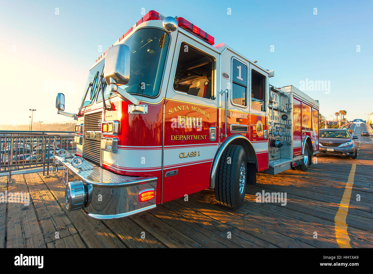 Firefighter 's truck at sunset Stock Photo - Alamy