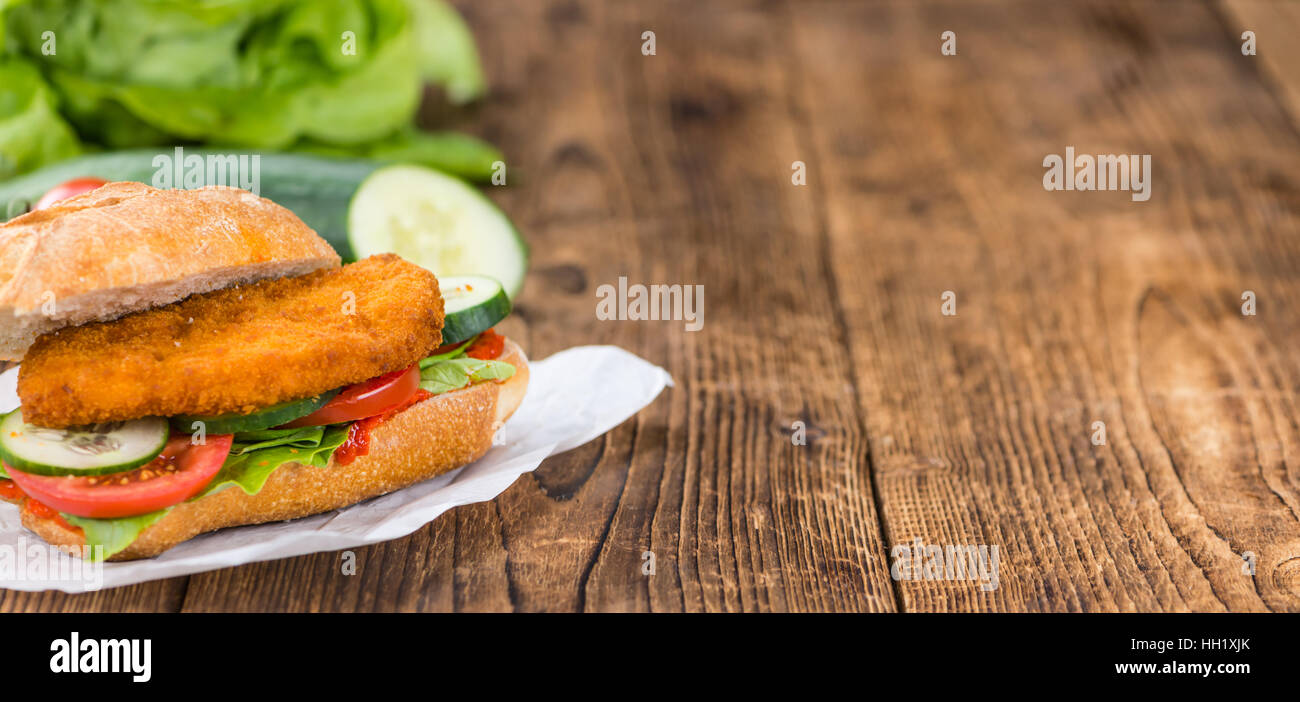Fresh made Chicken Schnitzel on a bun (close-up shot; selective focus ...