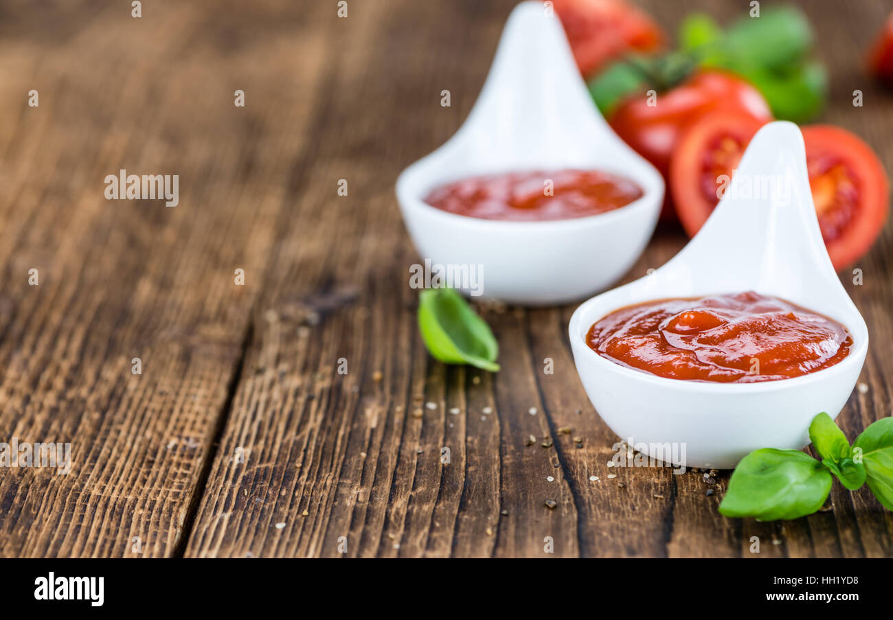 Fresh made Ketchup on a vintage background (close-up shot Stock Photo ...