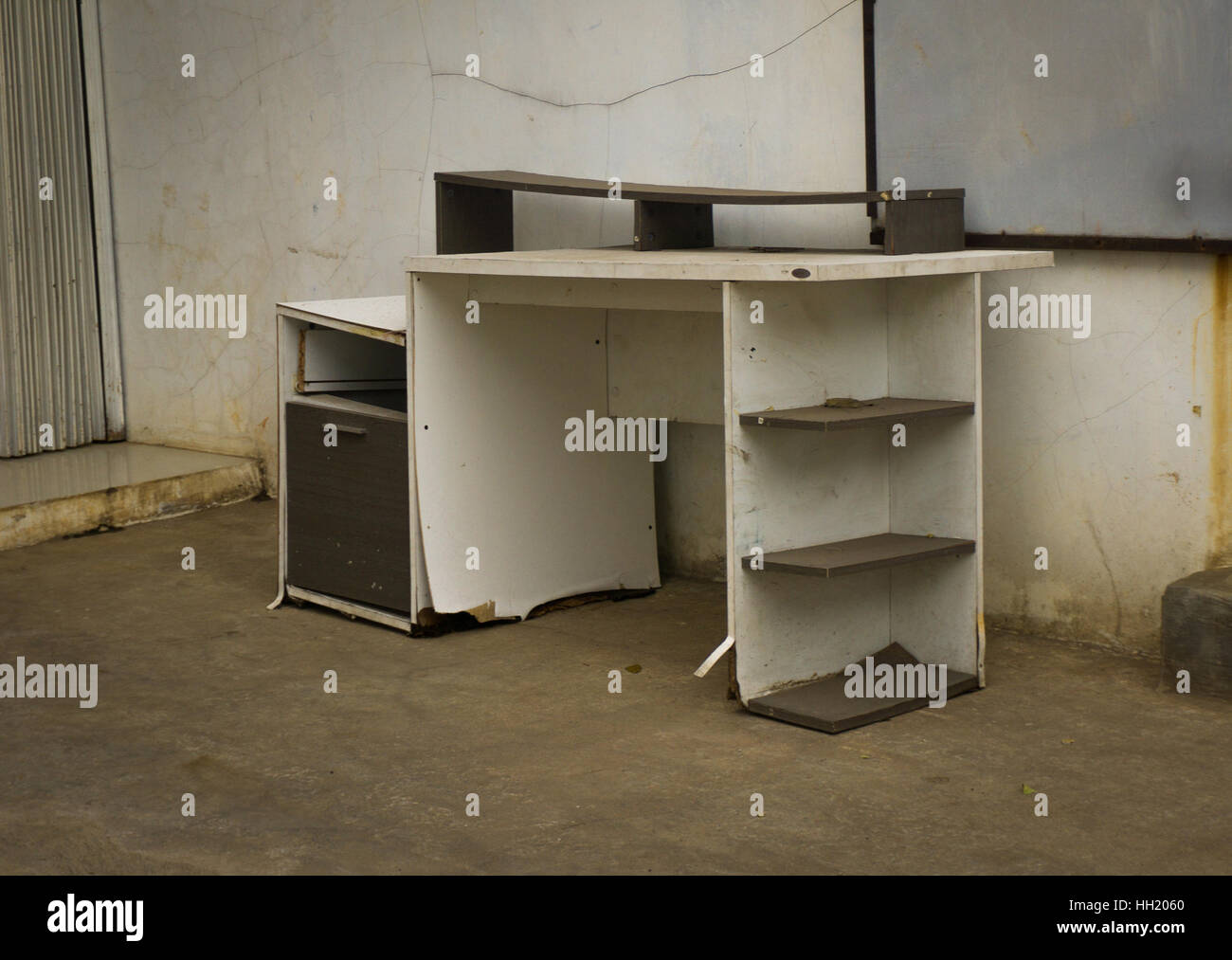 The broken table abandoned outside the building photo taken in Jakarta ...