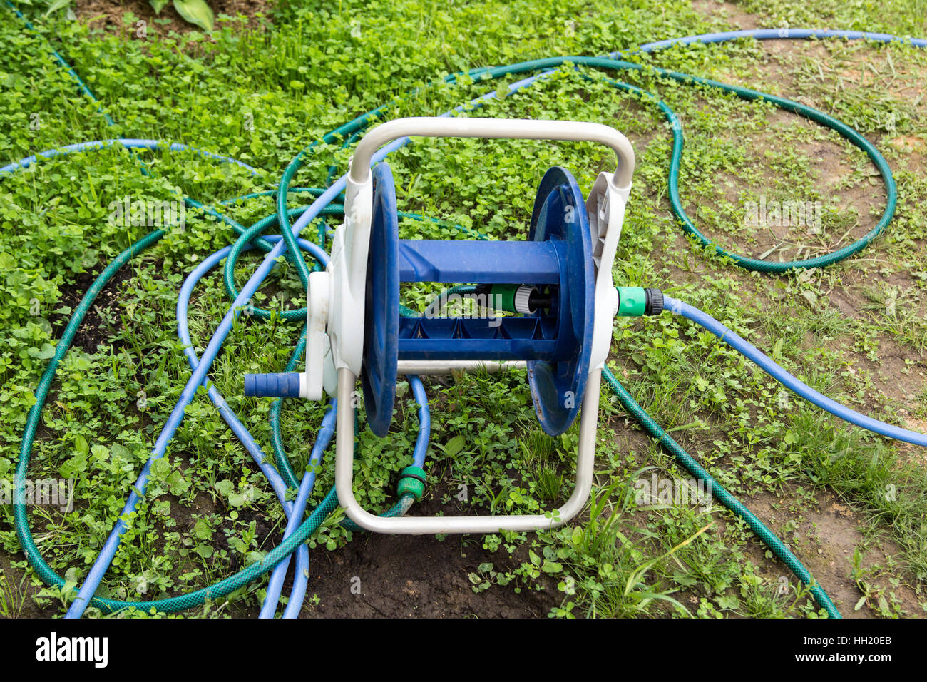 Sprinkler pipe at garden tangled hi-res stock photography and images ...