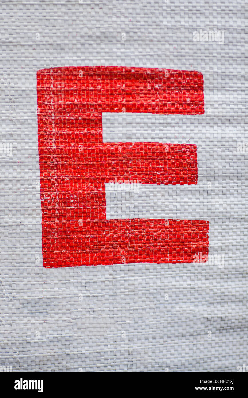 Red Letter E printed on a sack Stock Photo - Alamy