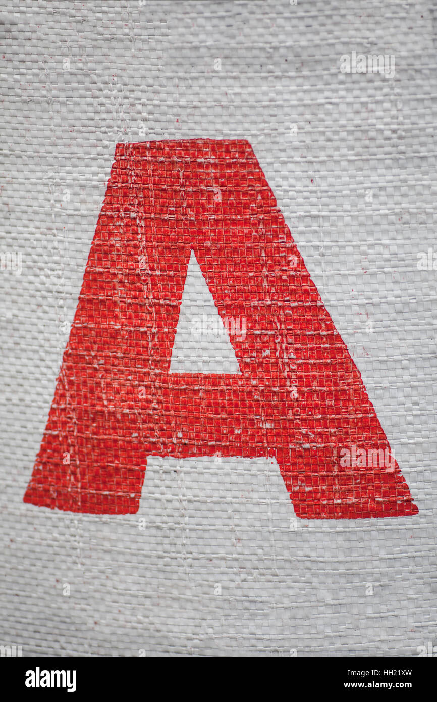Red Letter A printed on a sack Stock Photo - Alamy