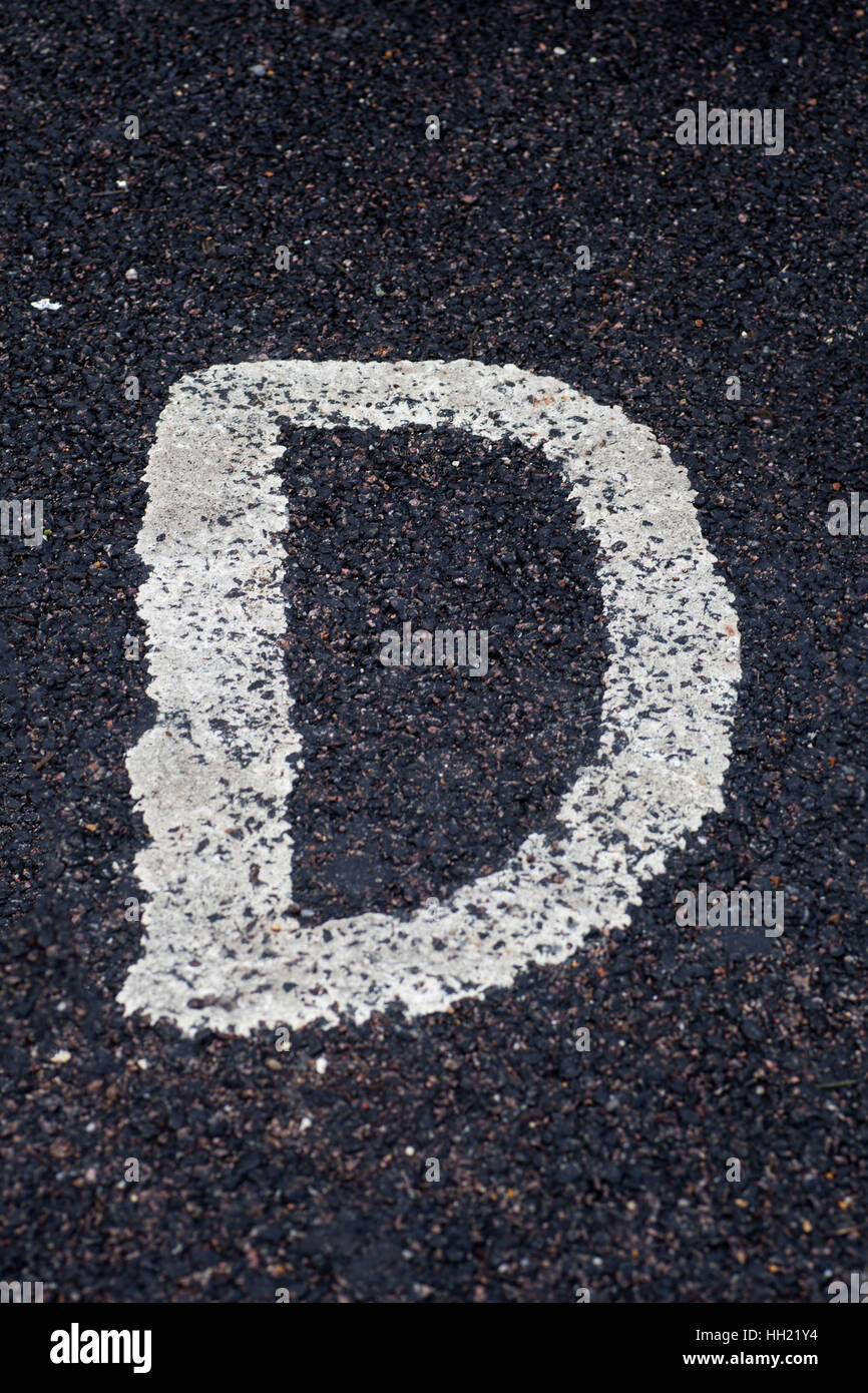 Letter D painted on the road Stock Photo - Alamy