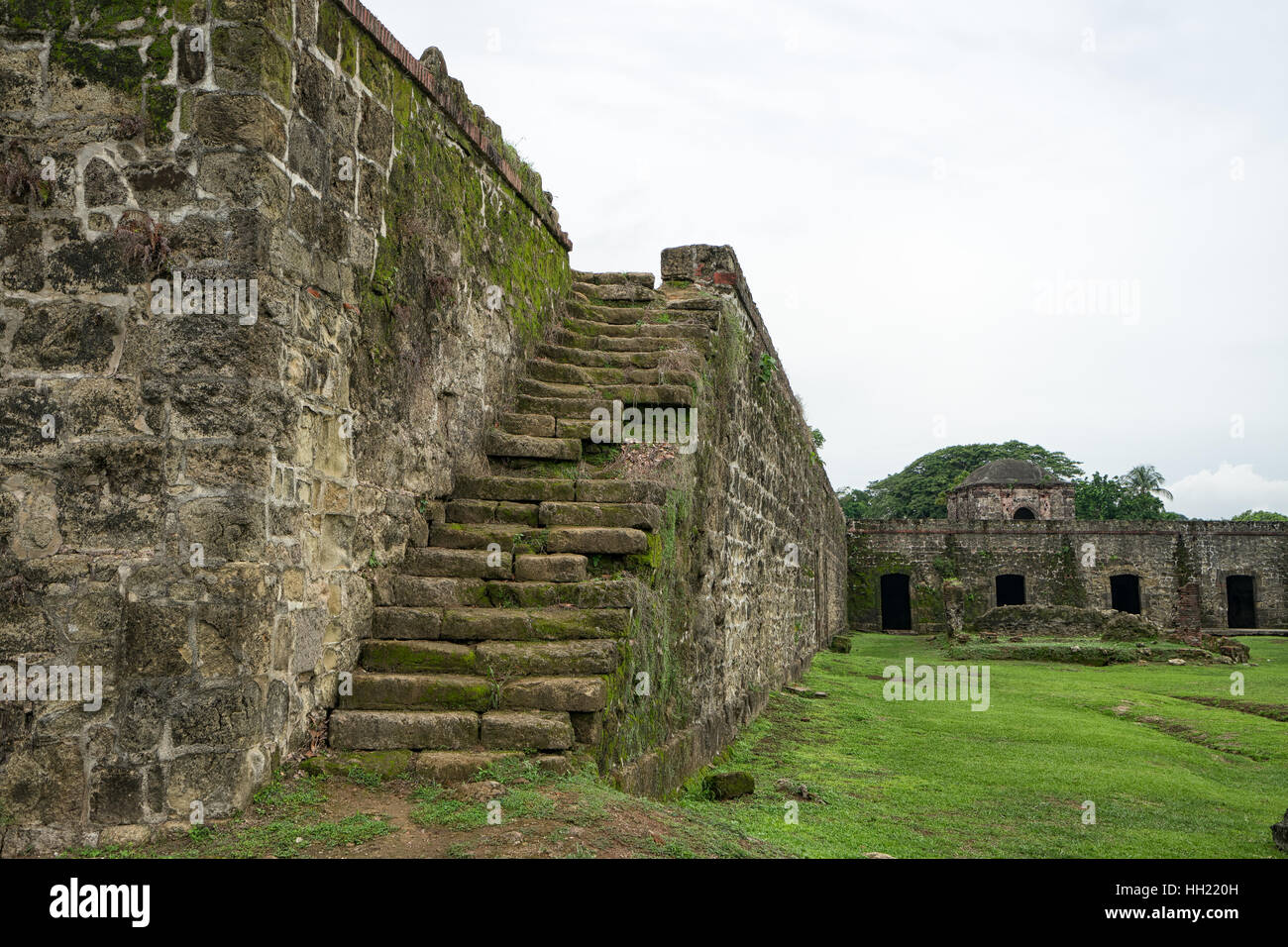 medieval fort stairs in Panama grown in with with moss Stock Photo - Alamy