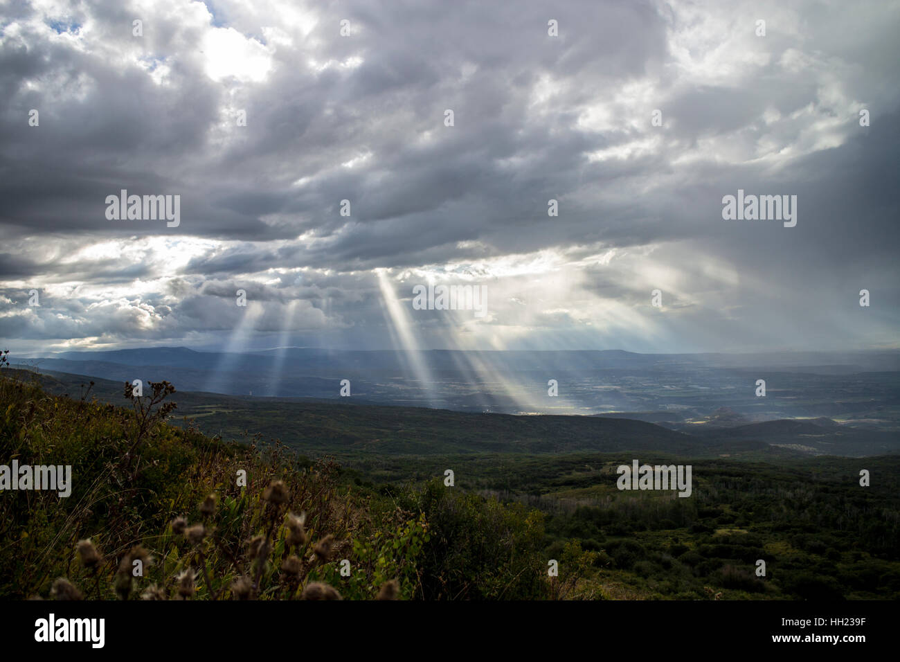 God rays through storm clouds hi-res stock photography and images - Alamy