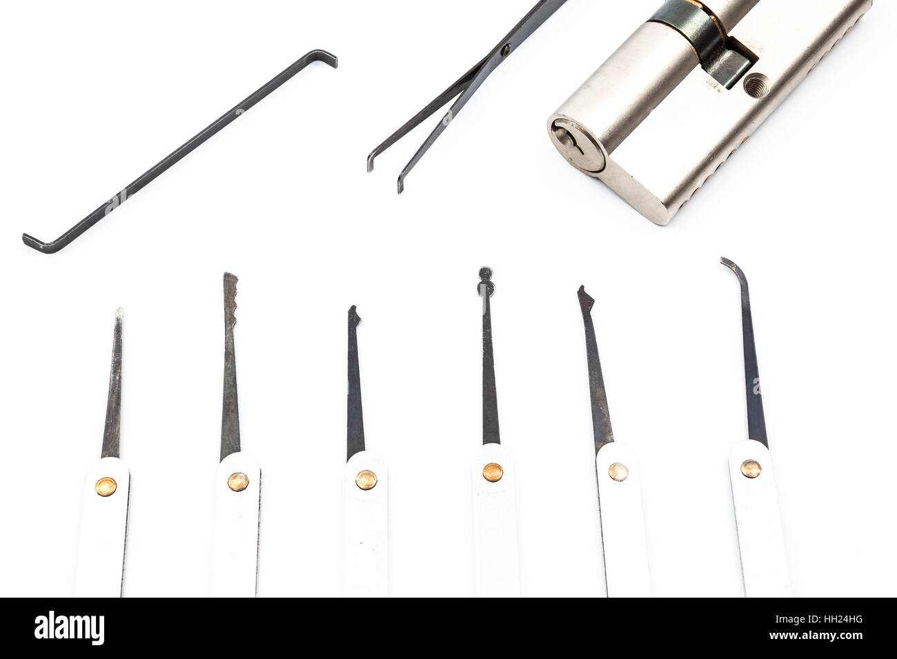 several lockpicking to open a lock on a door Stock Photo - Alamy