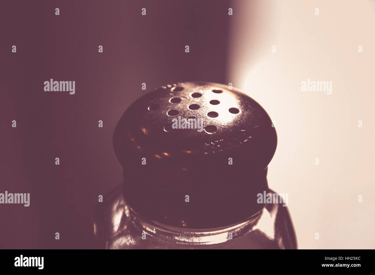 Photograph of a salt shaker close up Stock Photo - Alamy