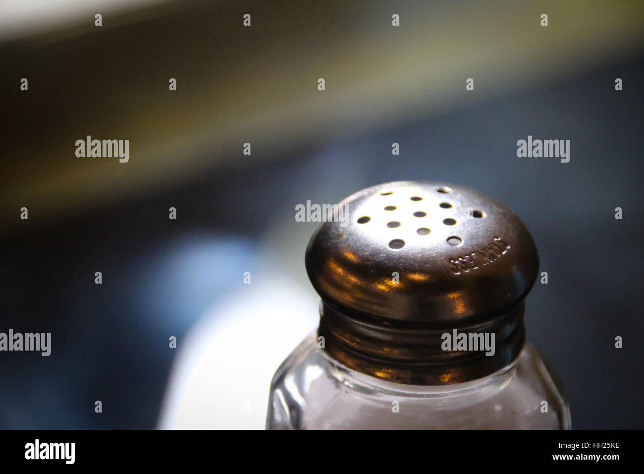 Photograph of a salt shaker close up Stock Photo - Alamy
